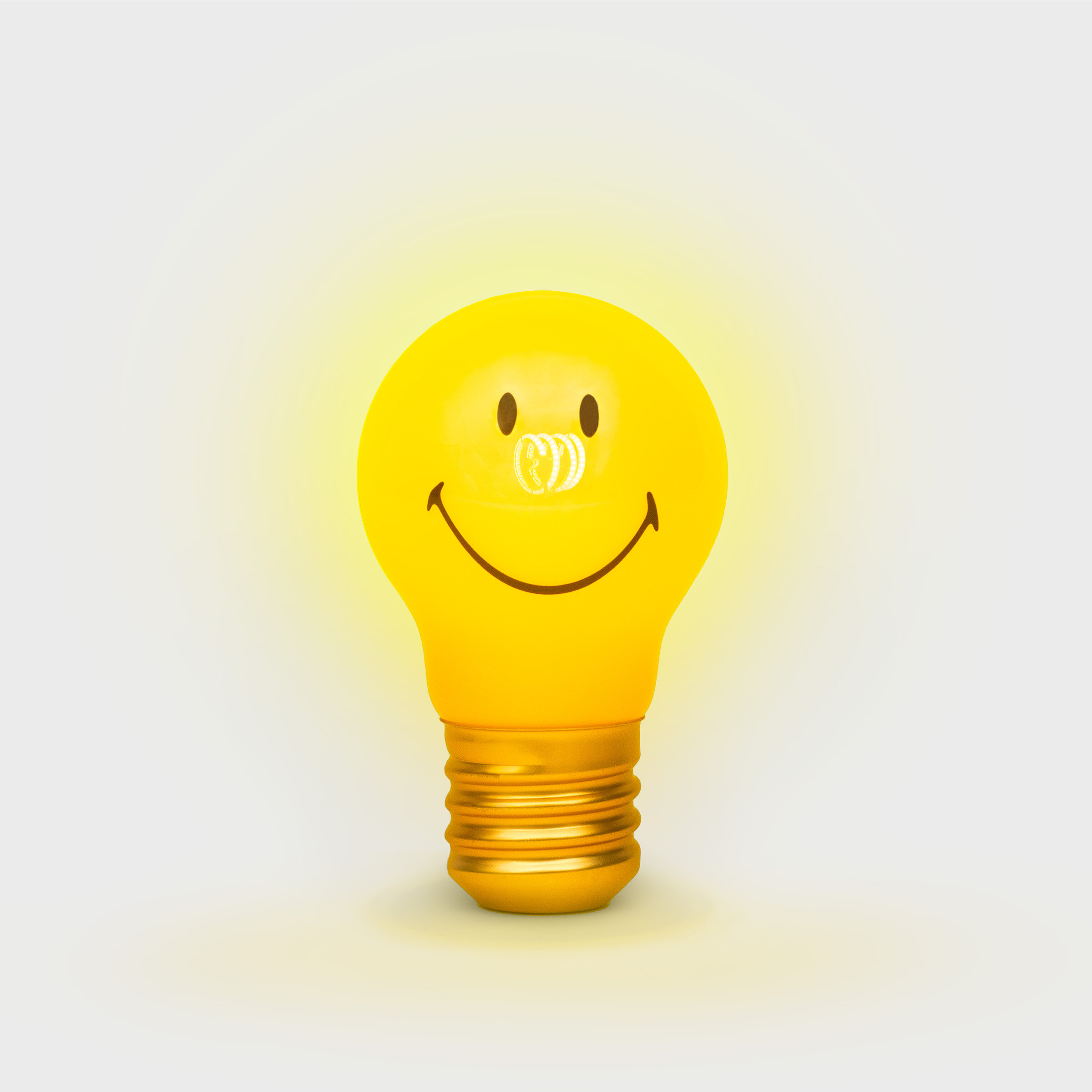 Cordless Smiley® Lightbulb : Rechargeable nightlight with a smile.