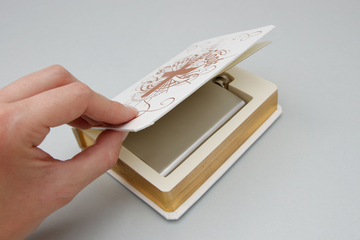 Flask In A Book : Stash your drink inside the Good Book.